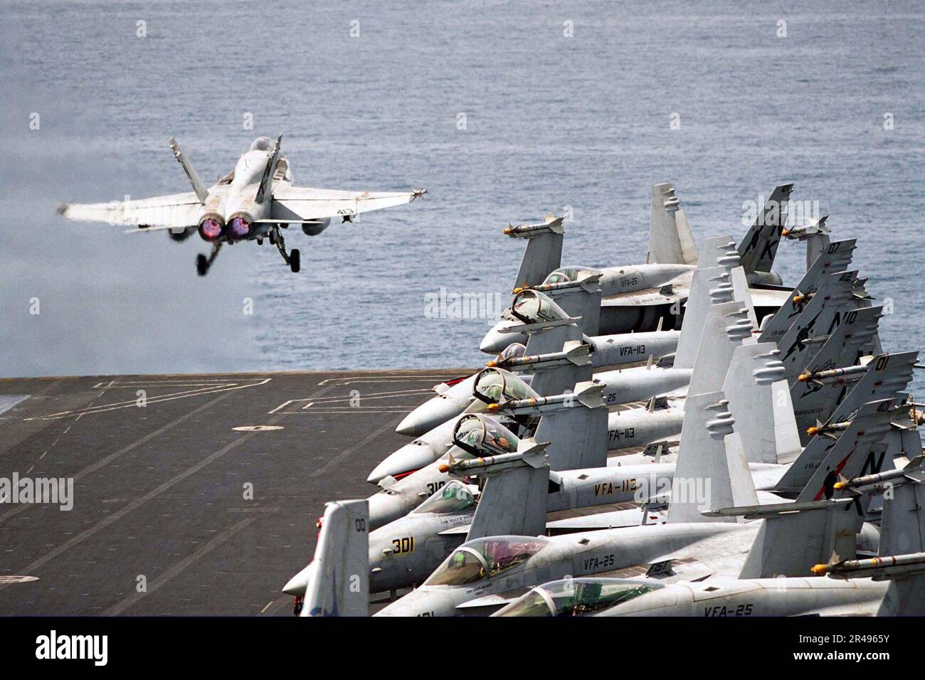 US Navy An F-A-18C Hornet launches from one of four steam-powered ...