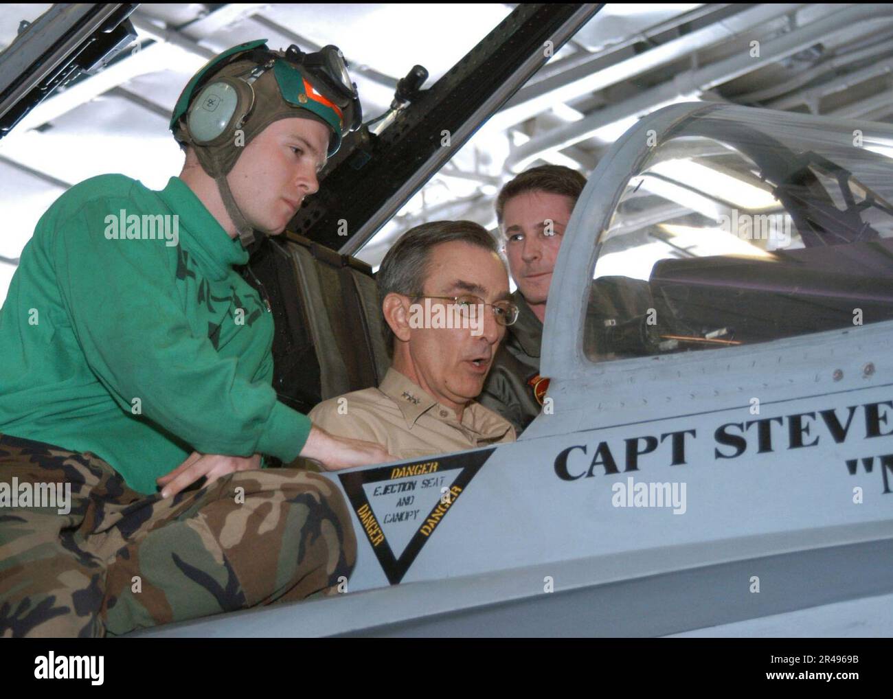 US Navy Vice Admiral Scott A. Fry is seated in the cockpit of an F-A ...