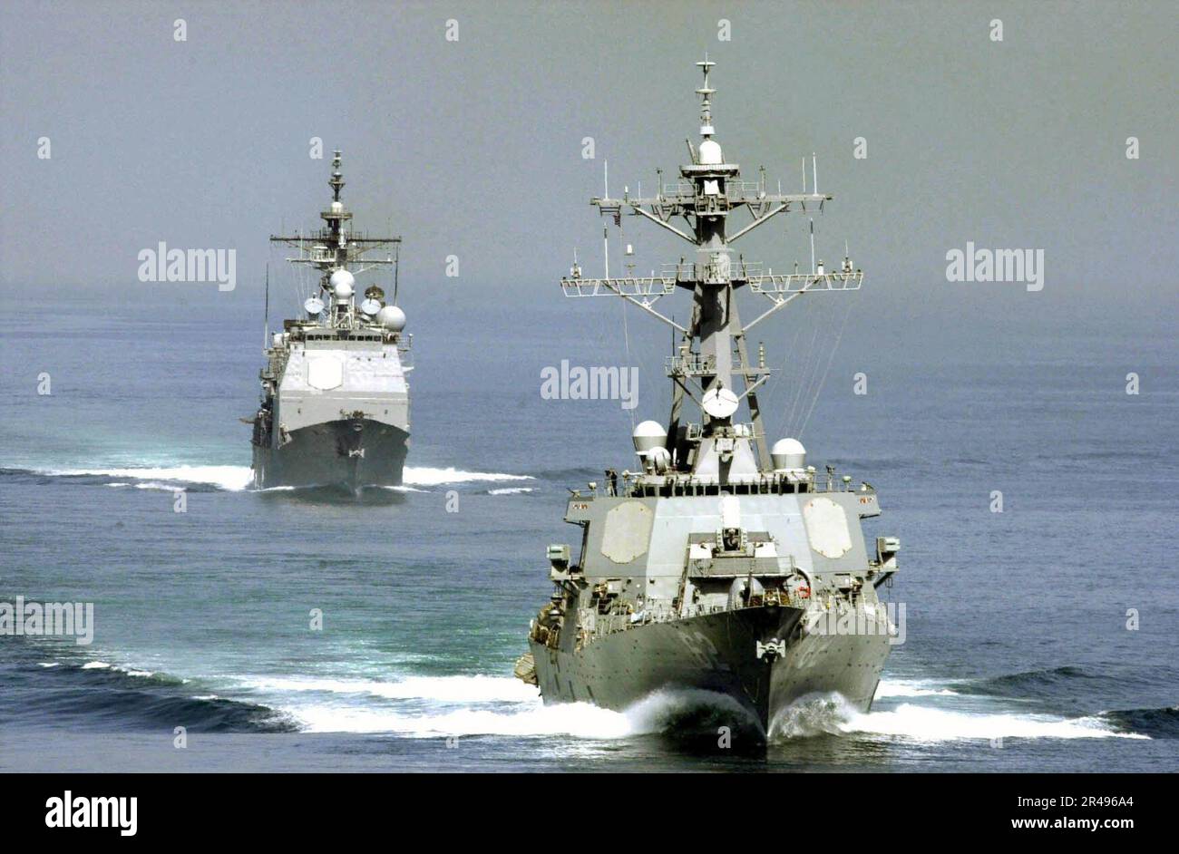 US Navy The guided missile cruiser USS Chosin (CG 65) (left) and guided ...