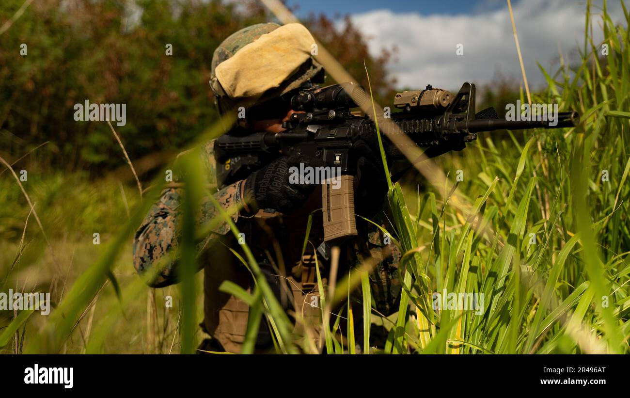 A U.S. Marine with 3rd Battalion, 12th Marines provides security during ...