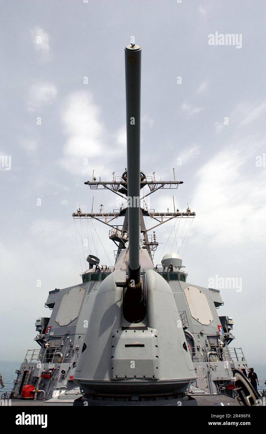 US Navy USS Donald Cook (DDG 75), a 54 caliber MK-45 five-inch lightweight gun provides surface ...