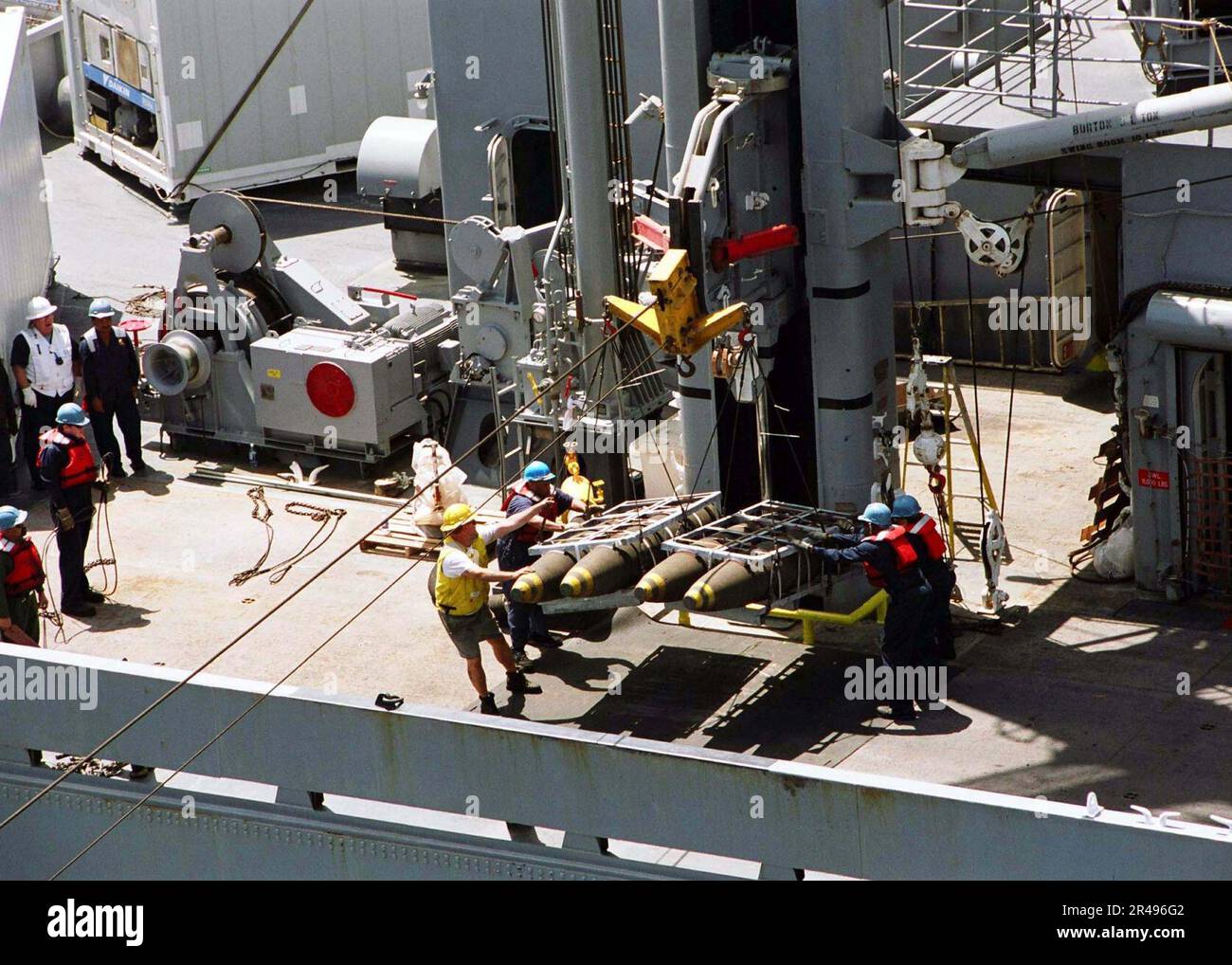 US Navy Sailors and civilians aboard the Militray Sealift Command (MSC ...