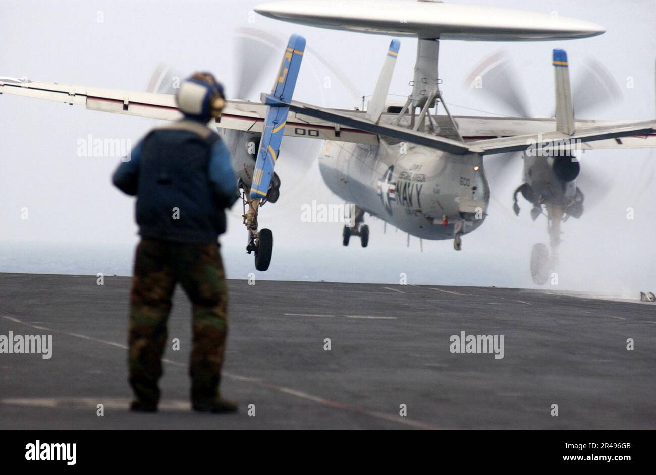 US Navy An E-2C Hawkeye launches from one of four steam-powered ...