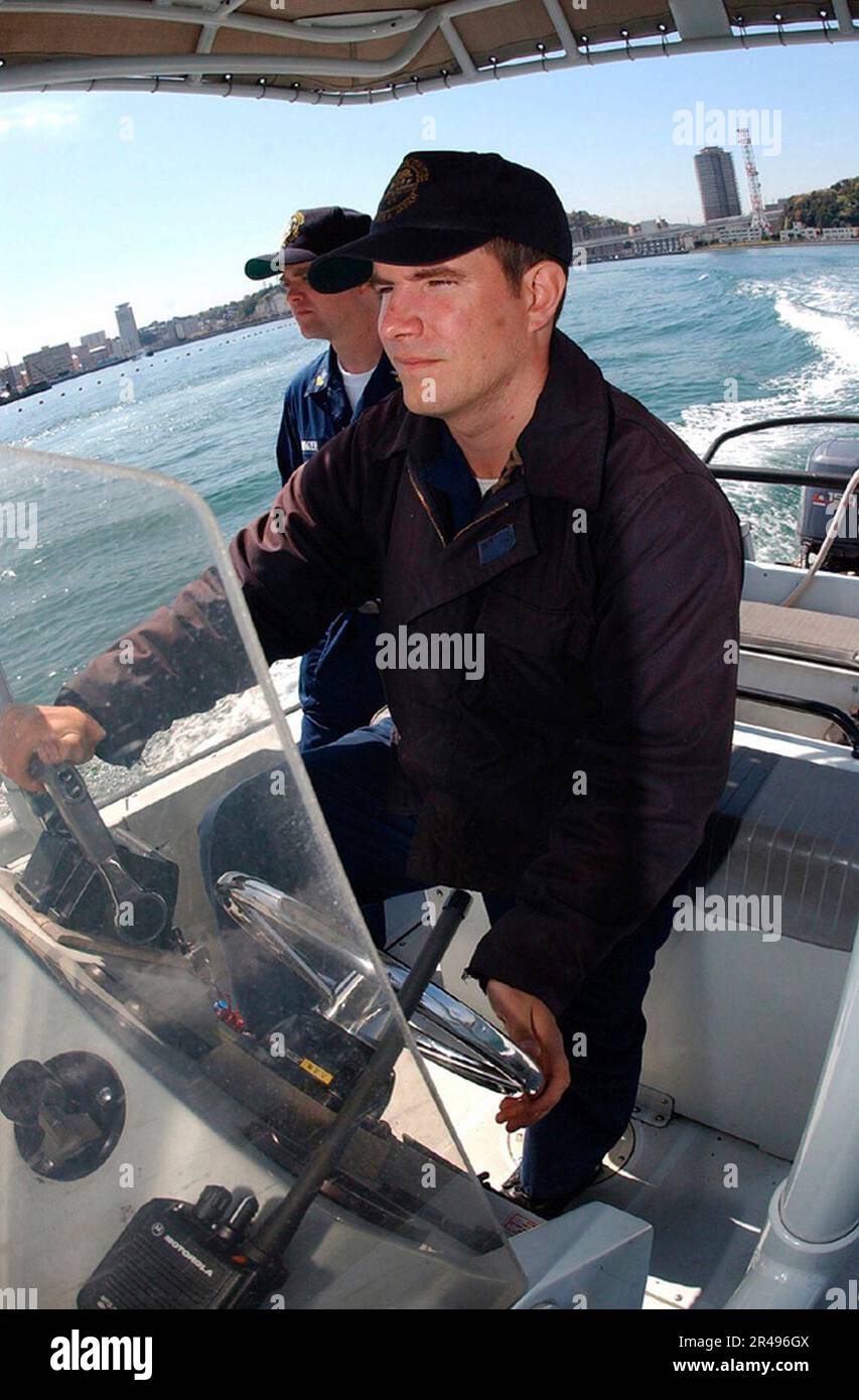 US Navy Sailors assigned to Command Fleet Activities Yokosuka's Port ...