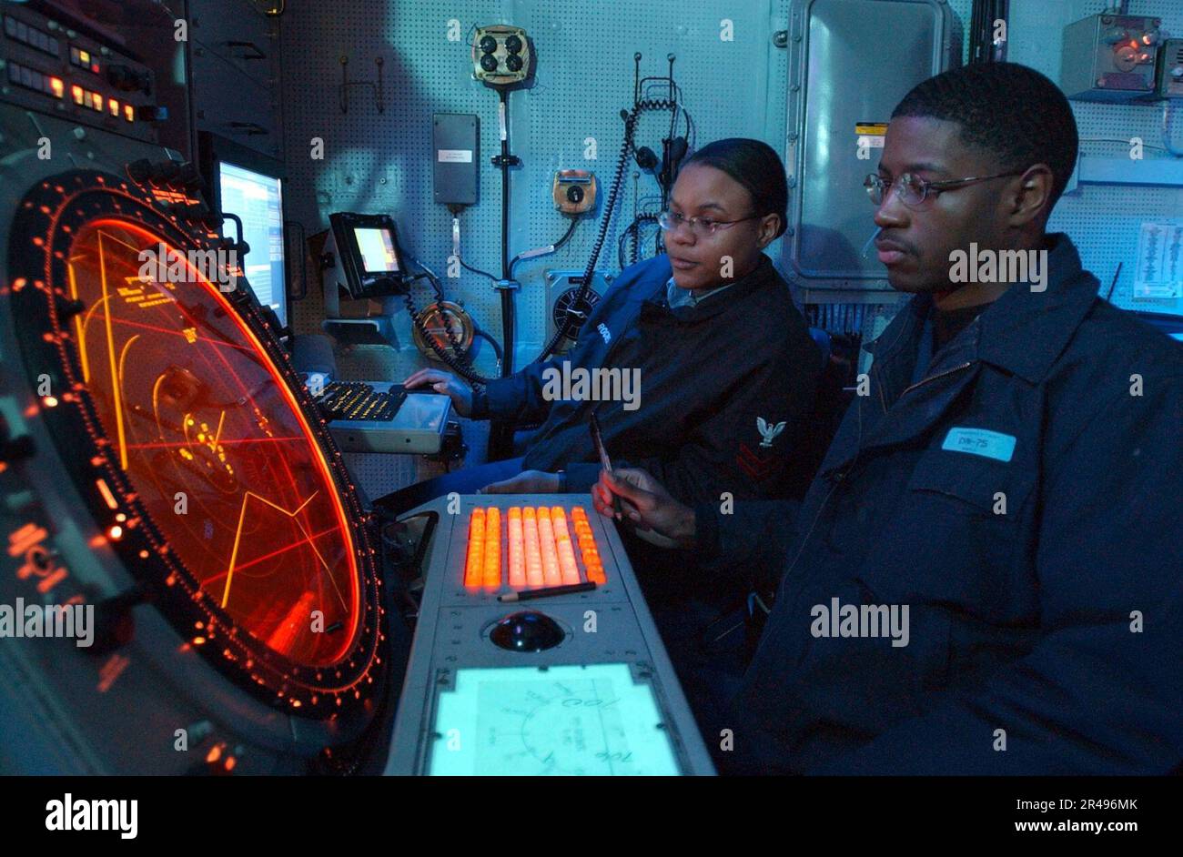 US Navy Two air traffic controllers stand watch at the 'Departure ...