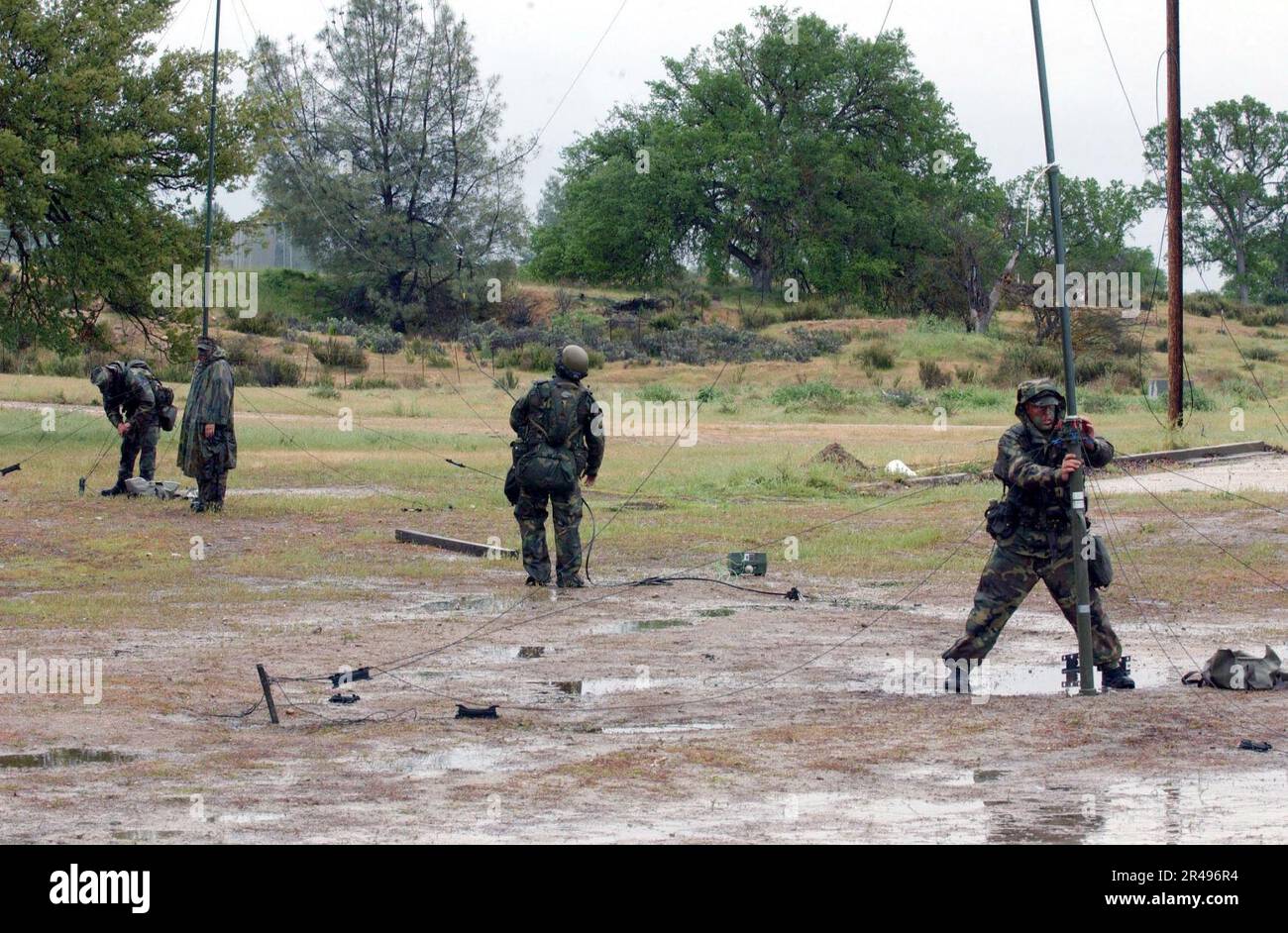 US Navy Seabee Engineer Reconnaissance Team (SERT) set up communication ...