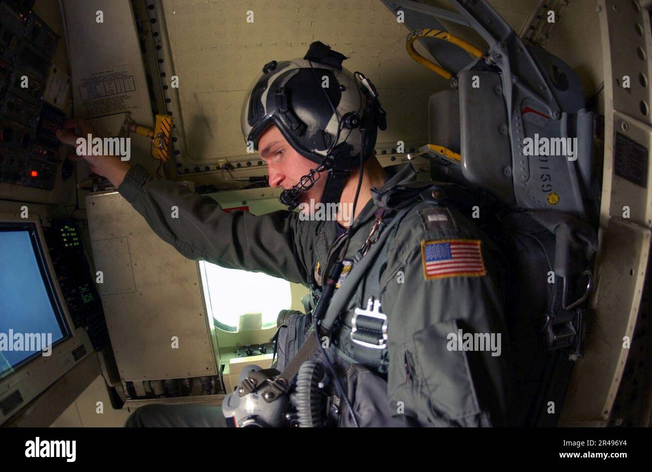 US Navy A U.S. Naval Flight Officer (NFO) adjusts his radar during his ...