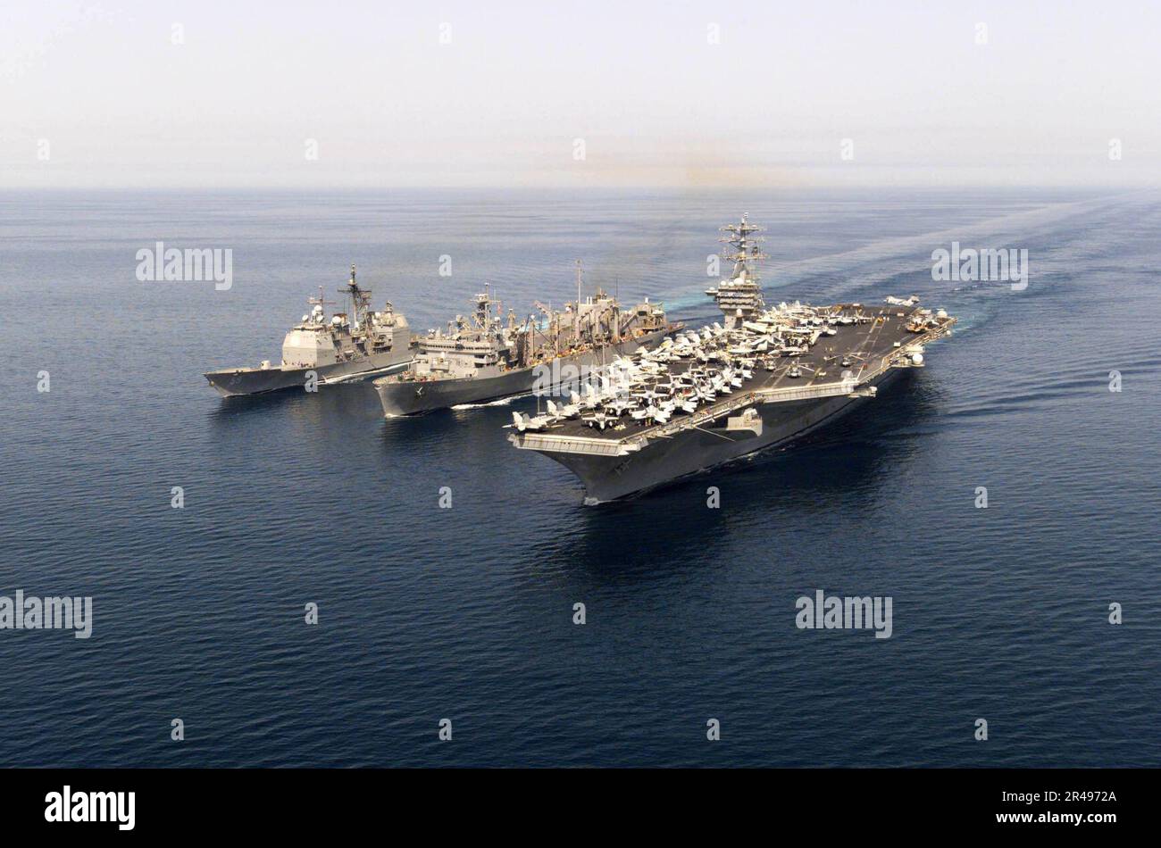 US Navy USS Nimitz (CVN 68), USS Princeton (CG 59), and USS Bridge (AOE ...