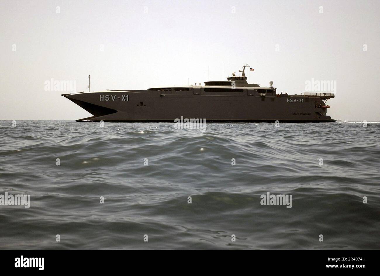US Navy Joint Venture (HSX-V1) prepares to receive a small boat from ...