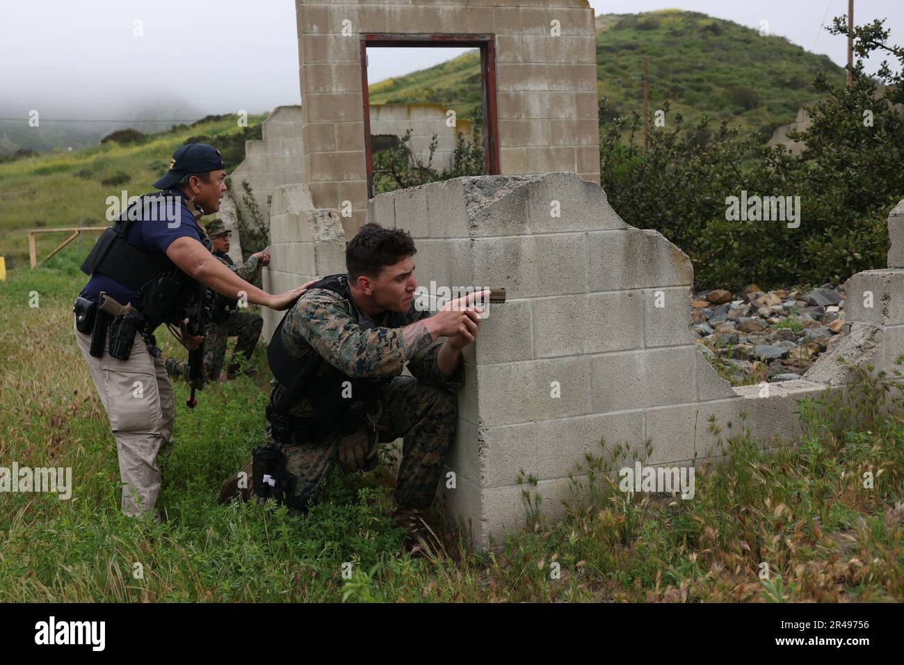 U.S. Marines and civilians with the Provost Marshal’s Office, Security ...