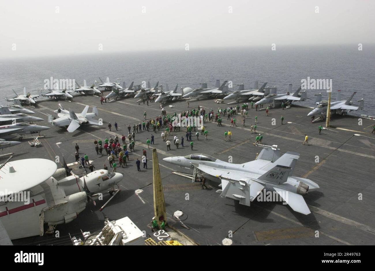 US Navy Sailors participate in the daily Foreign Object Damage (FOD ...