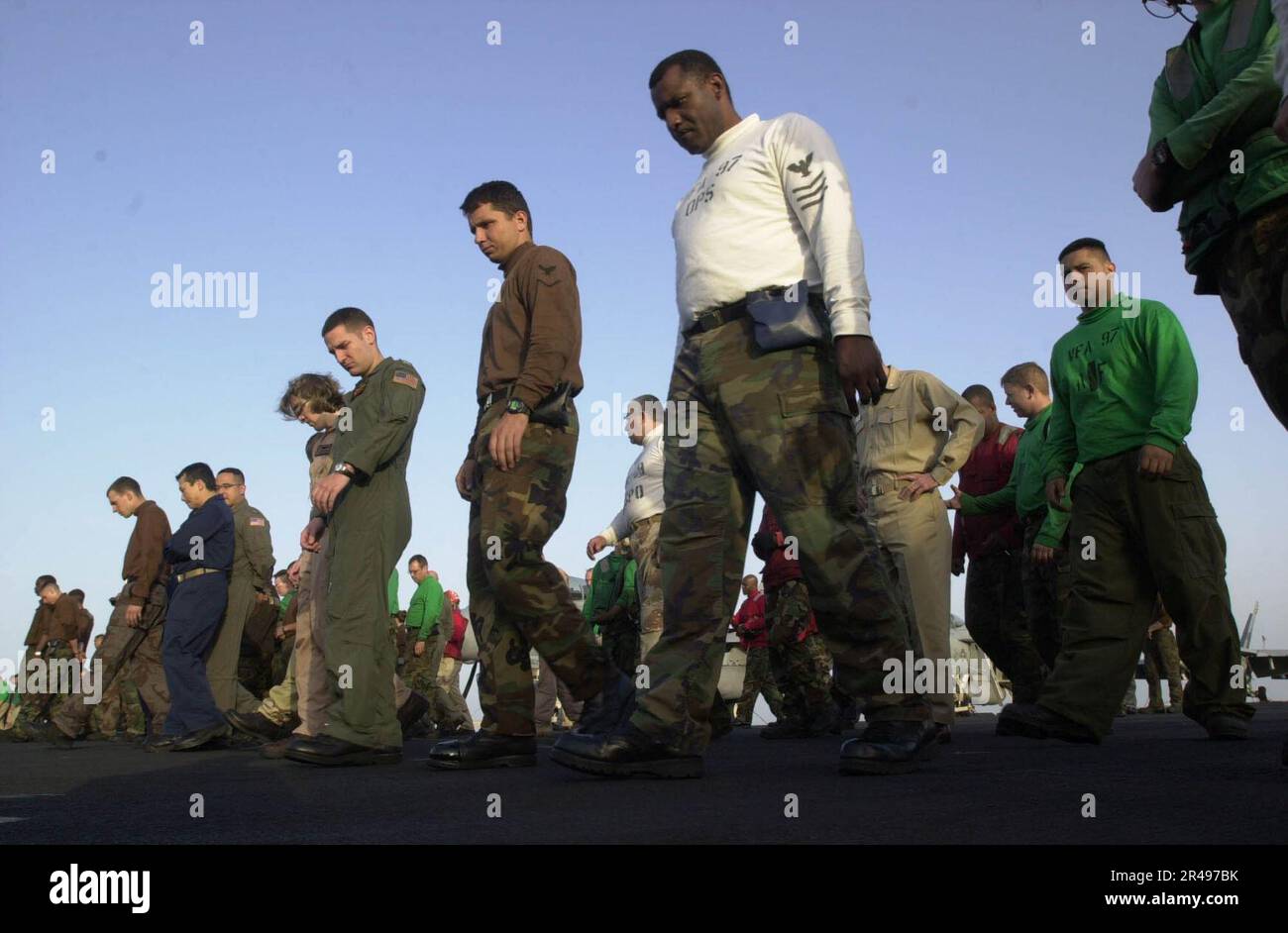 US Navy Sailors participate in the daily Foreign Object Damage (FOD ...