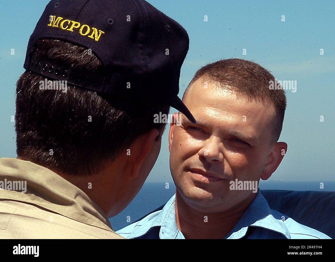 US Navy Master Chief Petty Officer of the Navy (MCPON) takes a moment ...