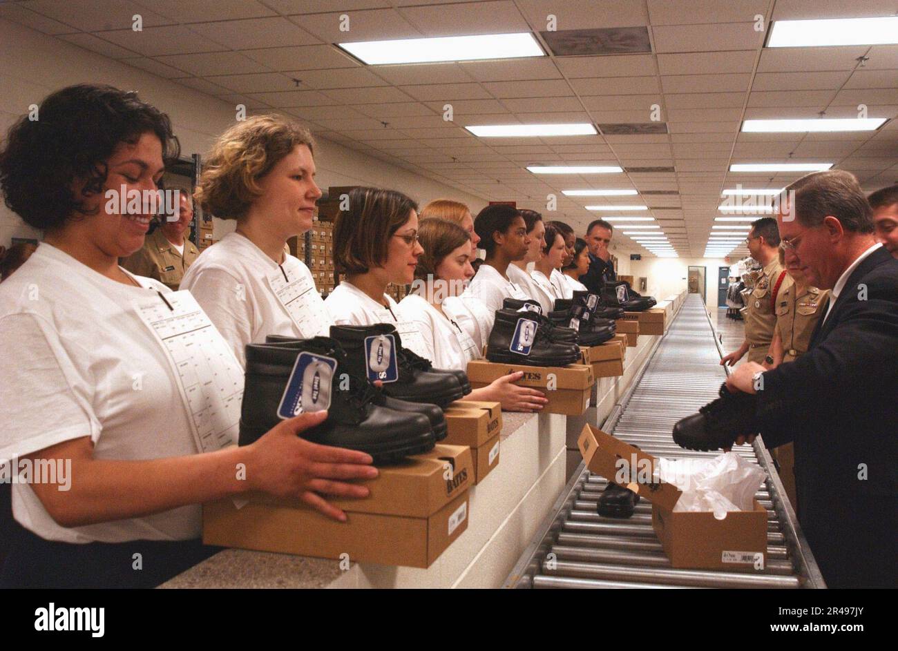 US Navy New recruits receive their lightweight boots on an assembly ...