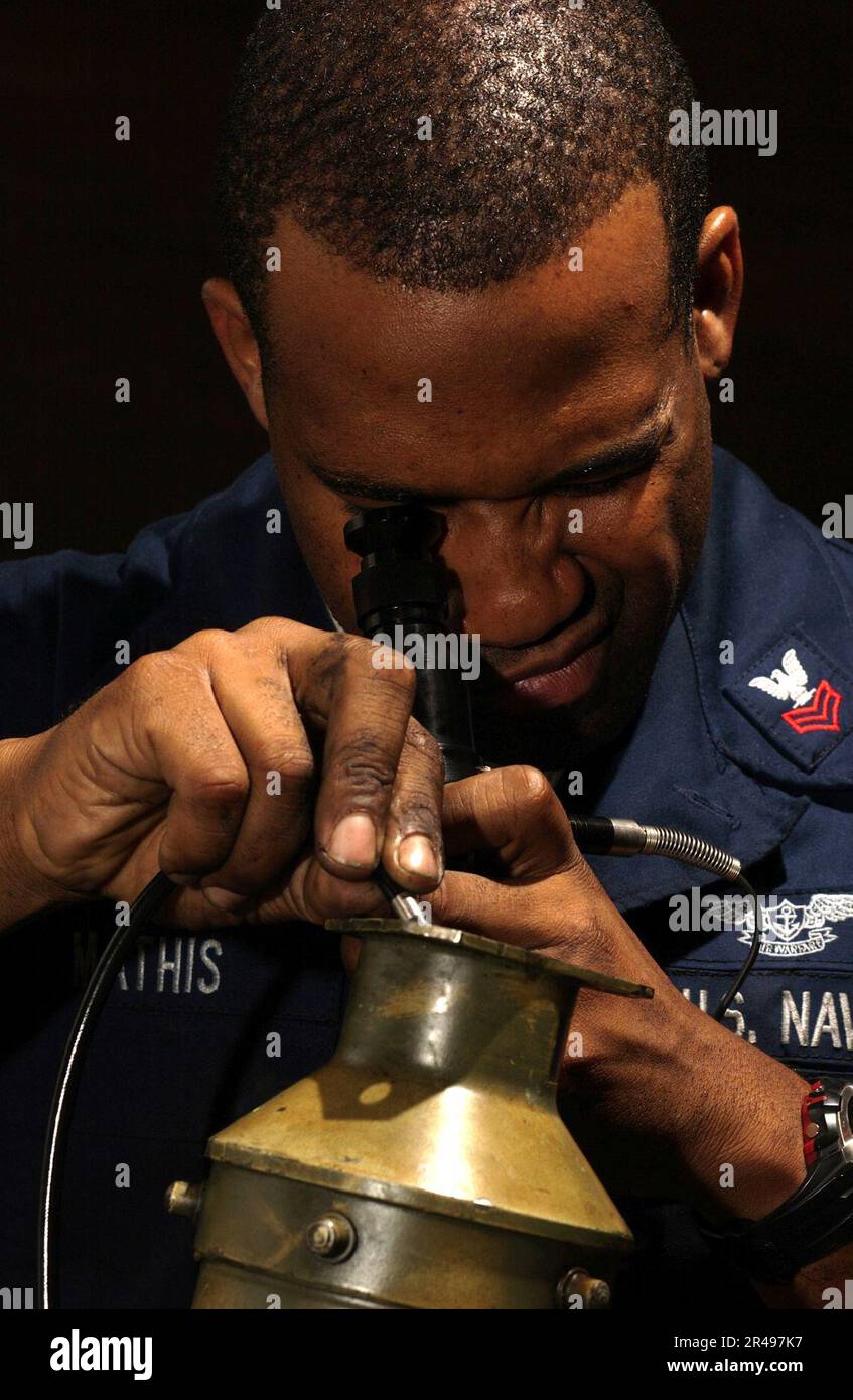 US Navy Aviation Machinist's Mate 1st Class assigned to the Blackhawks ...