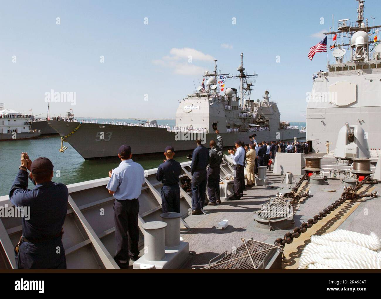 US Navy Sailors aboard USS Lake Chaplain (CG 57) man the rails in ...