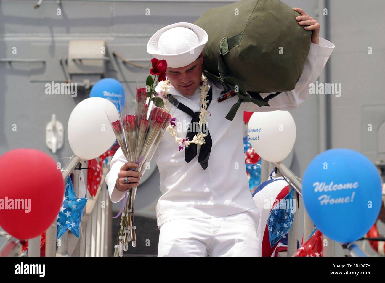 US Navy A Sailor rushes down the brow of Oliver Hazard Perry-class ...
