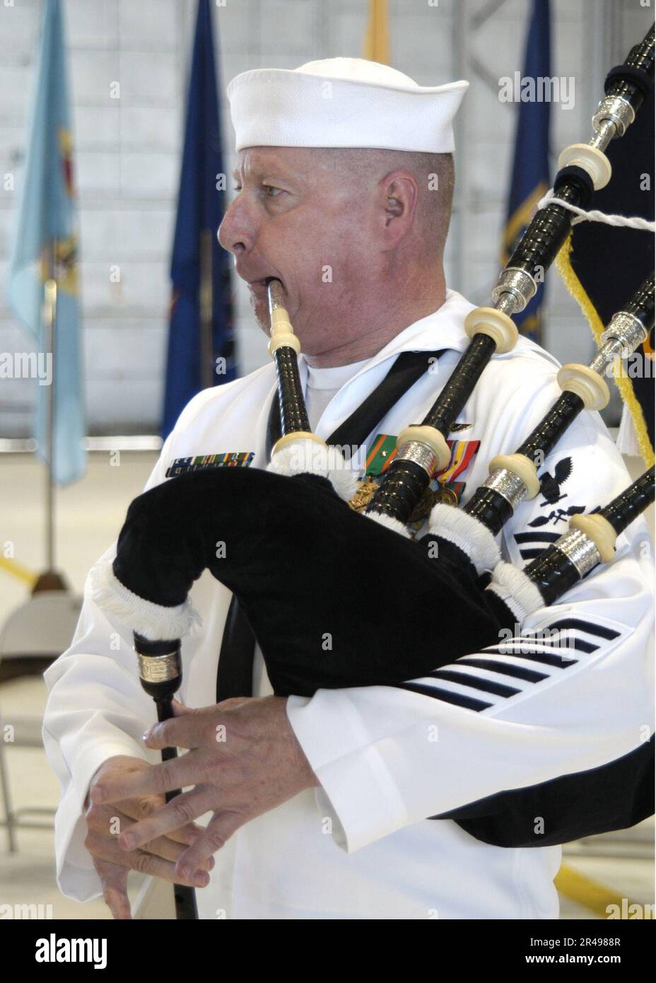 US Navy Aviation Structural Mechanic 1st Class plays the bagpipes at the Windjammers of Fleet ...