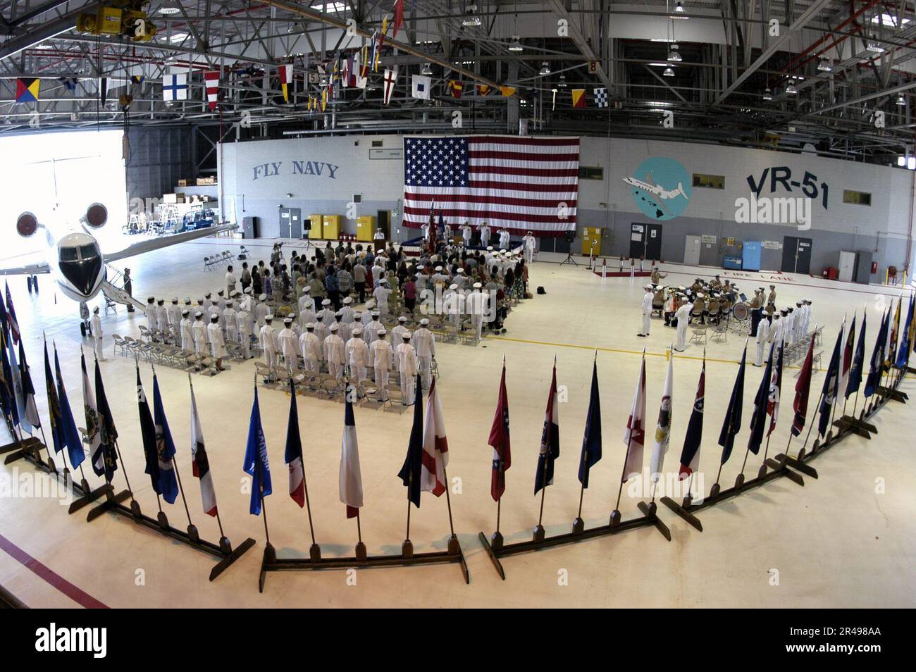 US Navy Cmdr. Douglas J. Mcilraith was relieved by Cmdr. David Valente ...