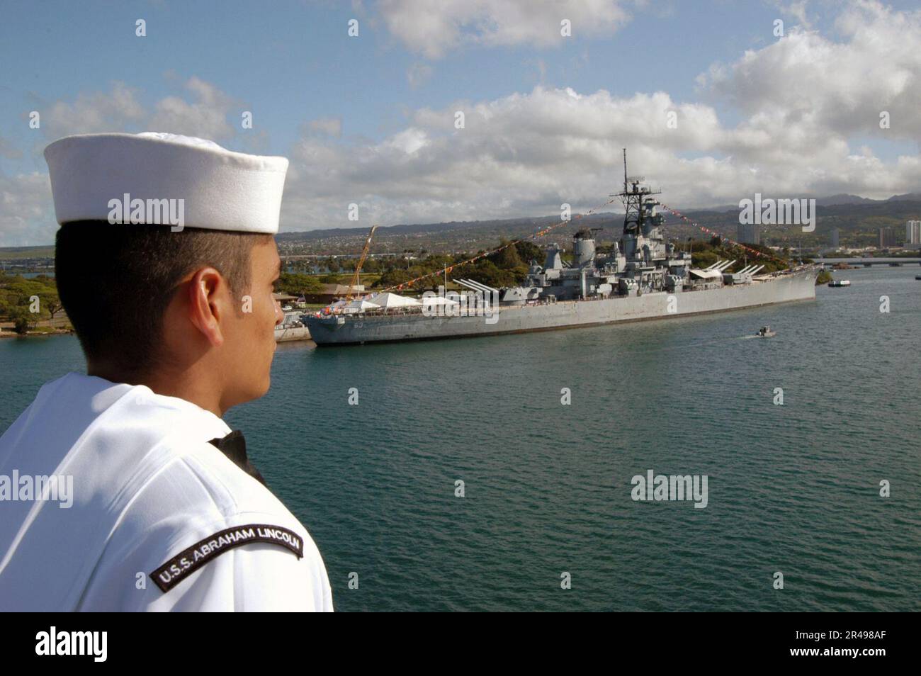 US Navy A Sailor aboard USS Abraham Lincoln (CVN 72) prepares to render ...