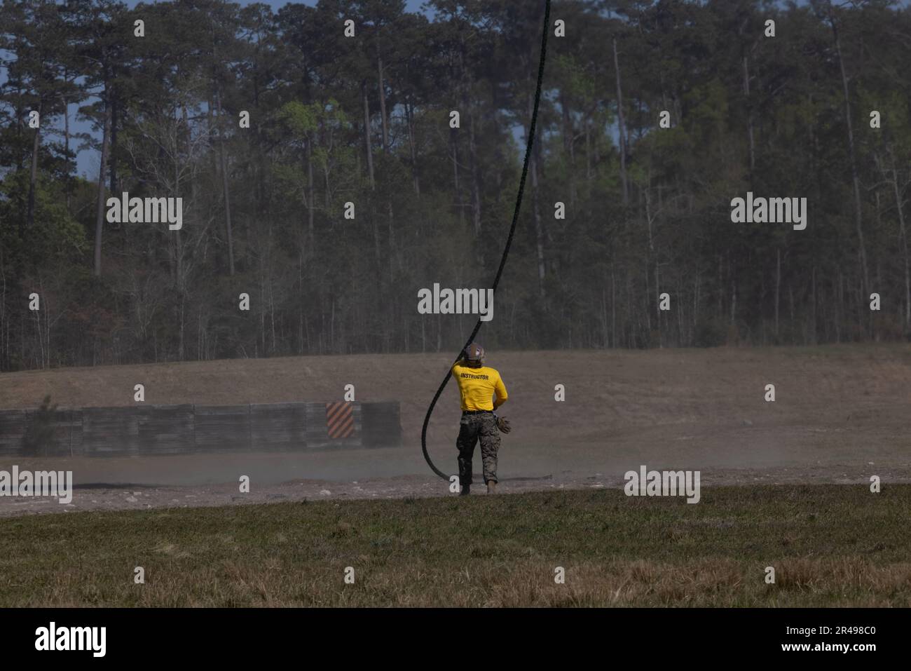U.S Marine Corps Staff Sgt. Devin Rockett, a ropes and recovery ...