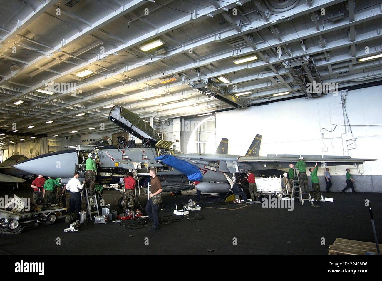 US Navy Sailors assigned to the Swordsman of Fighter Squadron Thirty ...