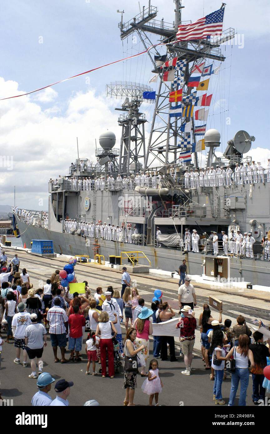 US Navy Friends and family members welcome the crew of the guided ...