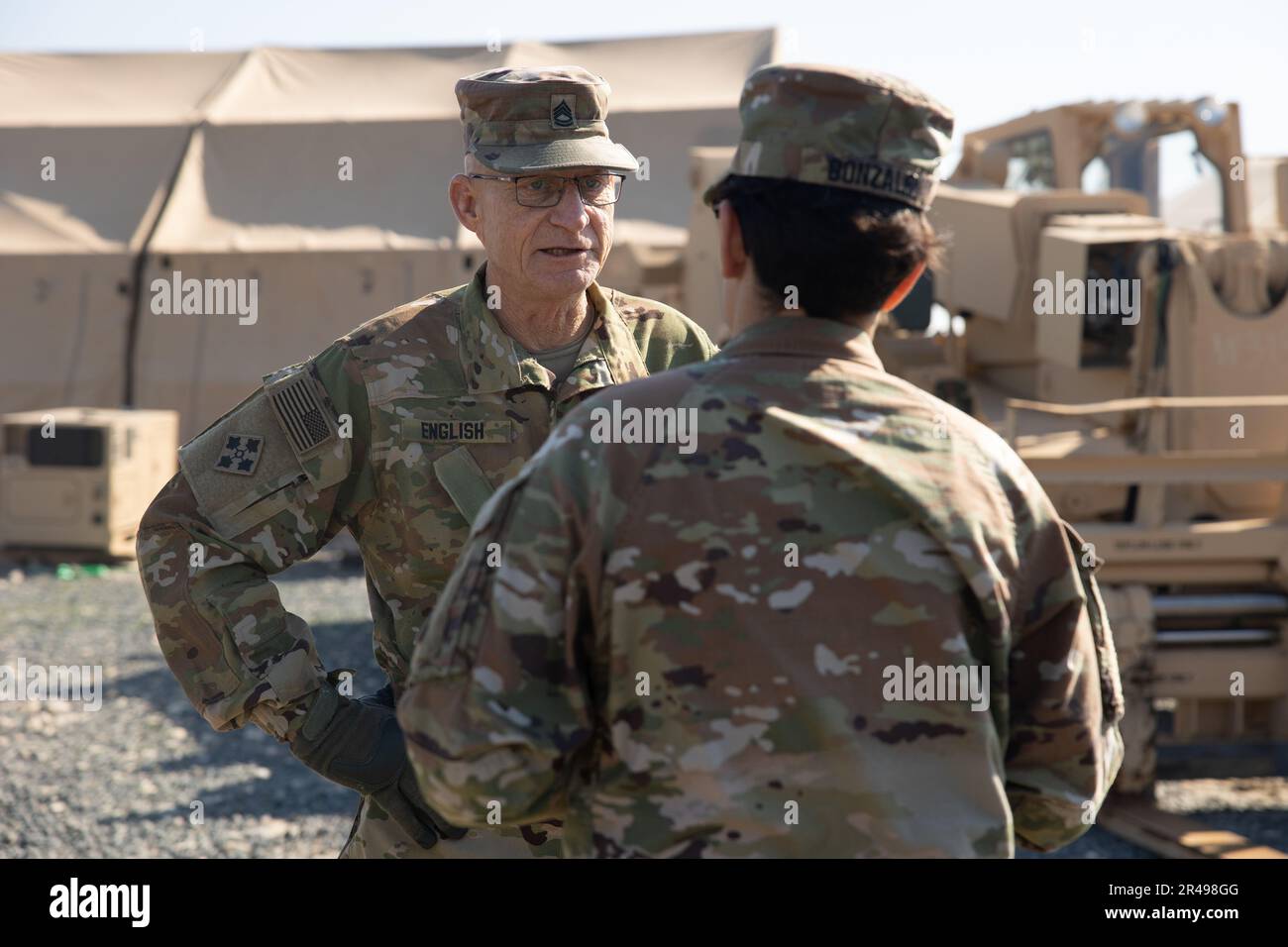 U.S. Army Reserve Sgt. 1st Class Thomas English (left), a petroleum ...