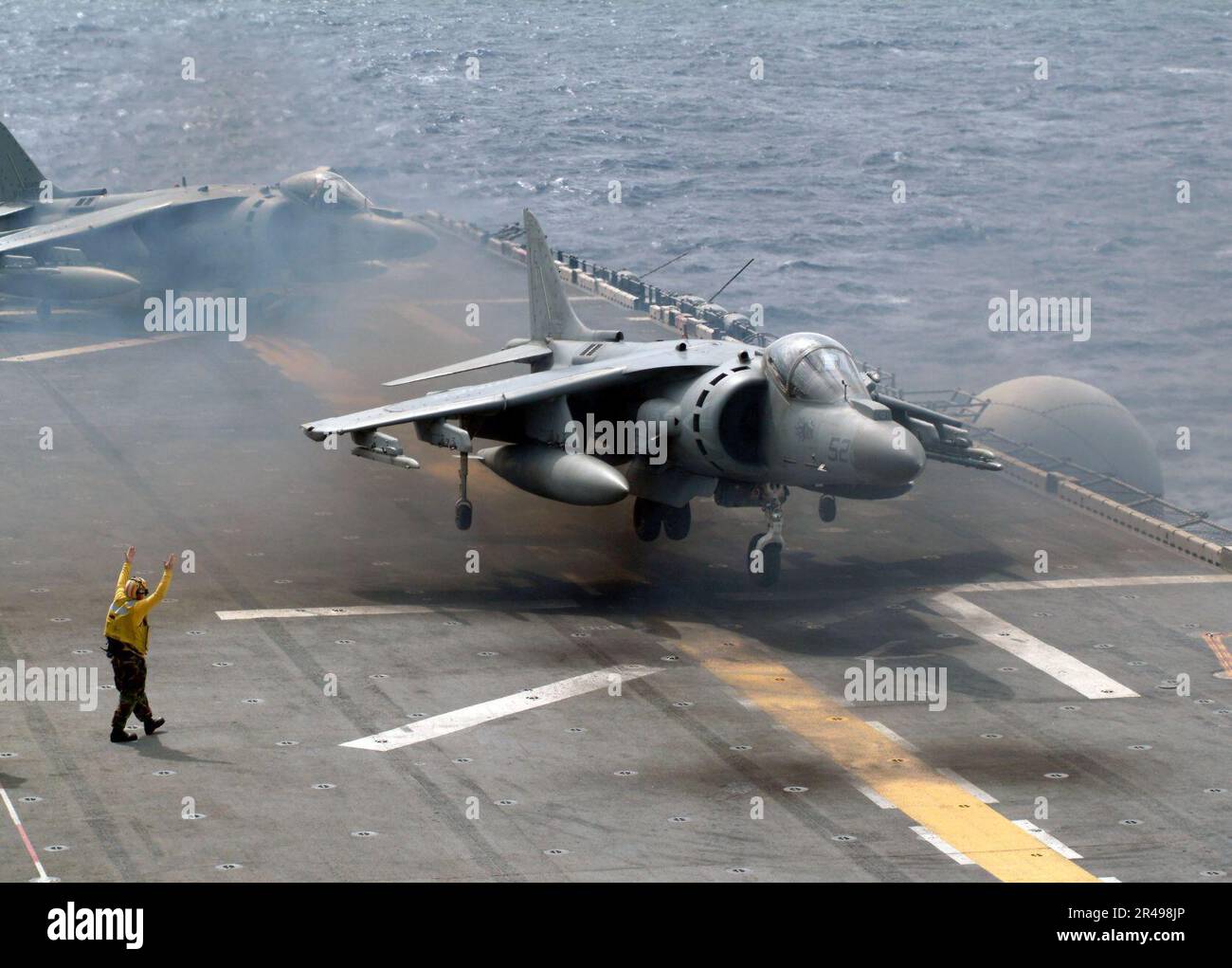 US Navy Aviation Boatswain's Mate 1st Class gives the go ahead for an ...