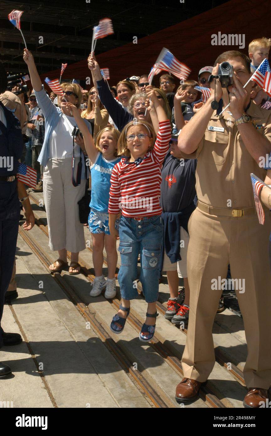 US Navy Friends and family members await the return of Carrier Air Wing ...