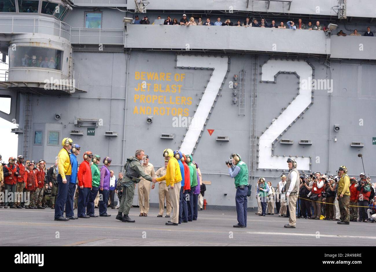 US Navy President George W. Bush greets Sailors aboard USS Abraham ...