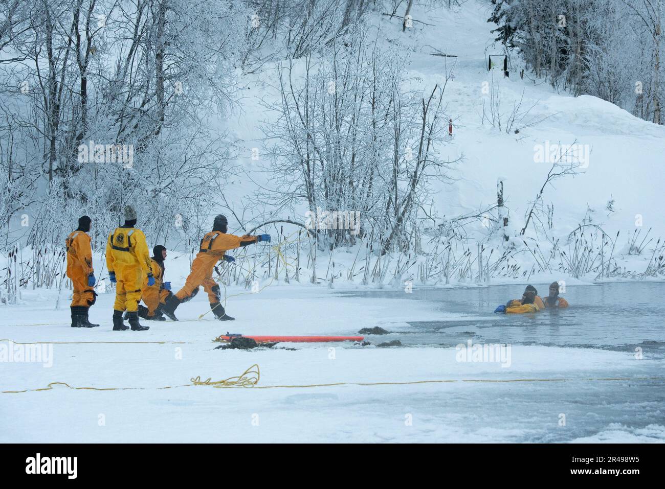 U.S. Air Force fire protection specialists assigned to the 673d Civil ...