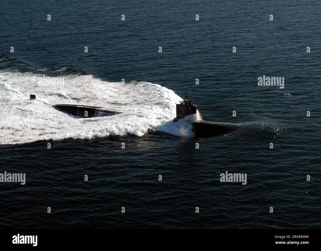 US Navy A Los Angeles Class fast-attack submarine steams along on the ...