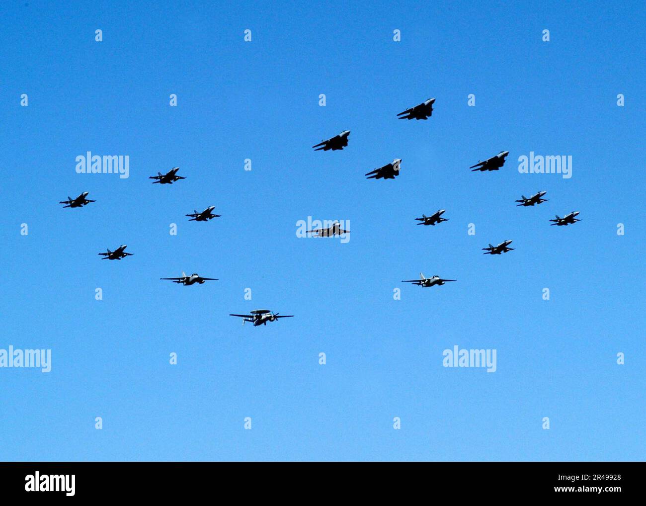 US Navy Aircraft assigned to Carrier Air Wing Eight (CVW-8) fly in formation as they pass over ...