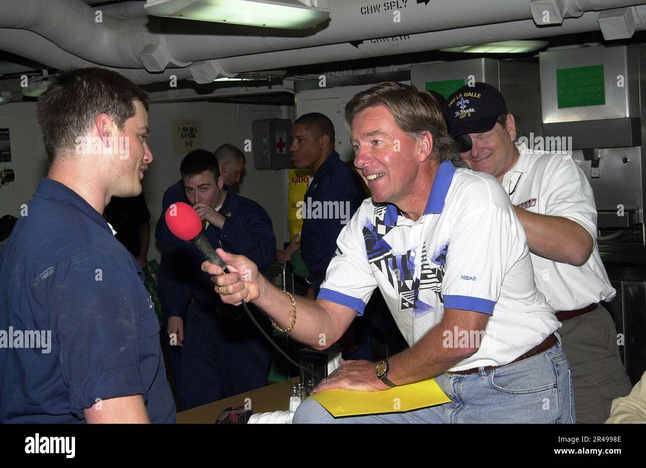 US Navy A Sailor is interviewed by a reporter Stock Photo - Alamy