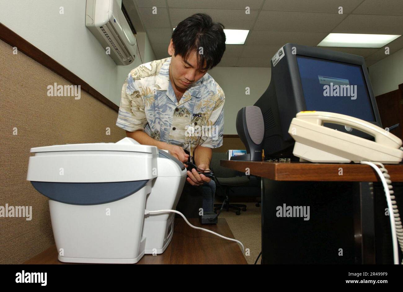 US Navy A NMCI Tech rep insalls a printer Stock Photo - Alamy