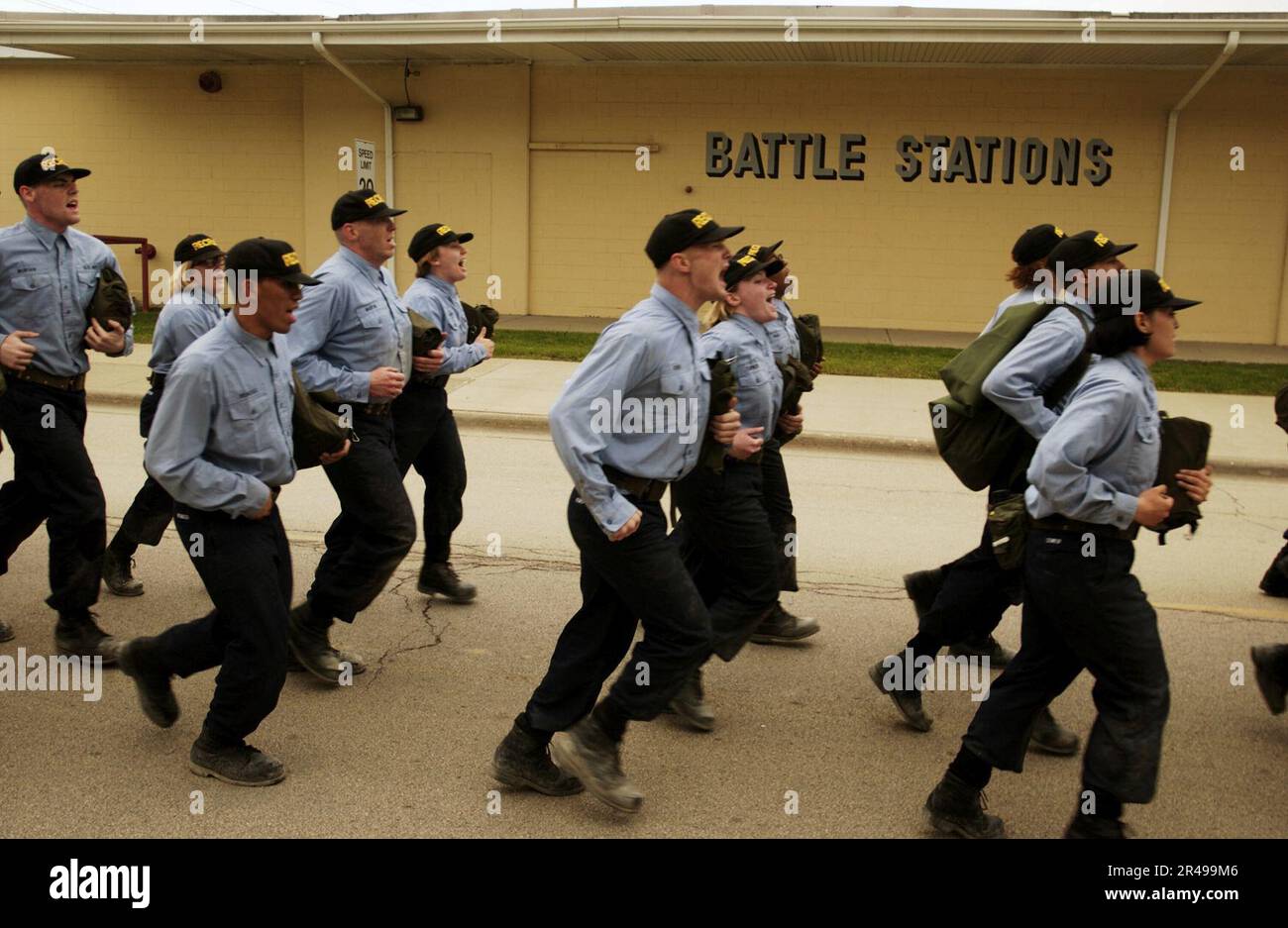 US Navy A recruit division sings as they successfully complete the ...