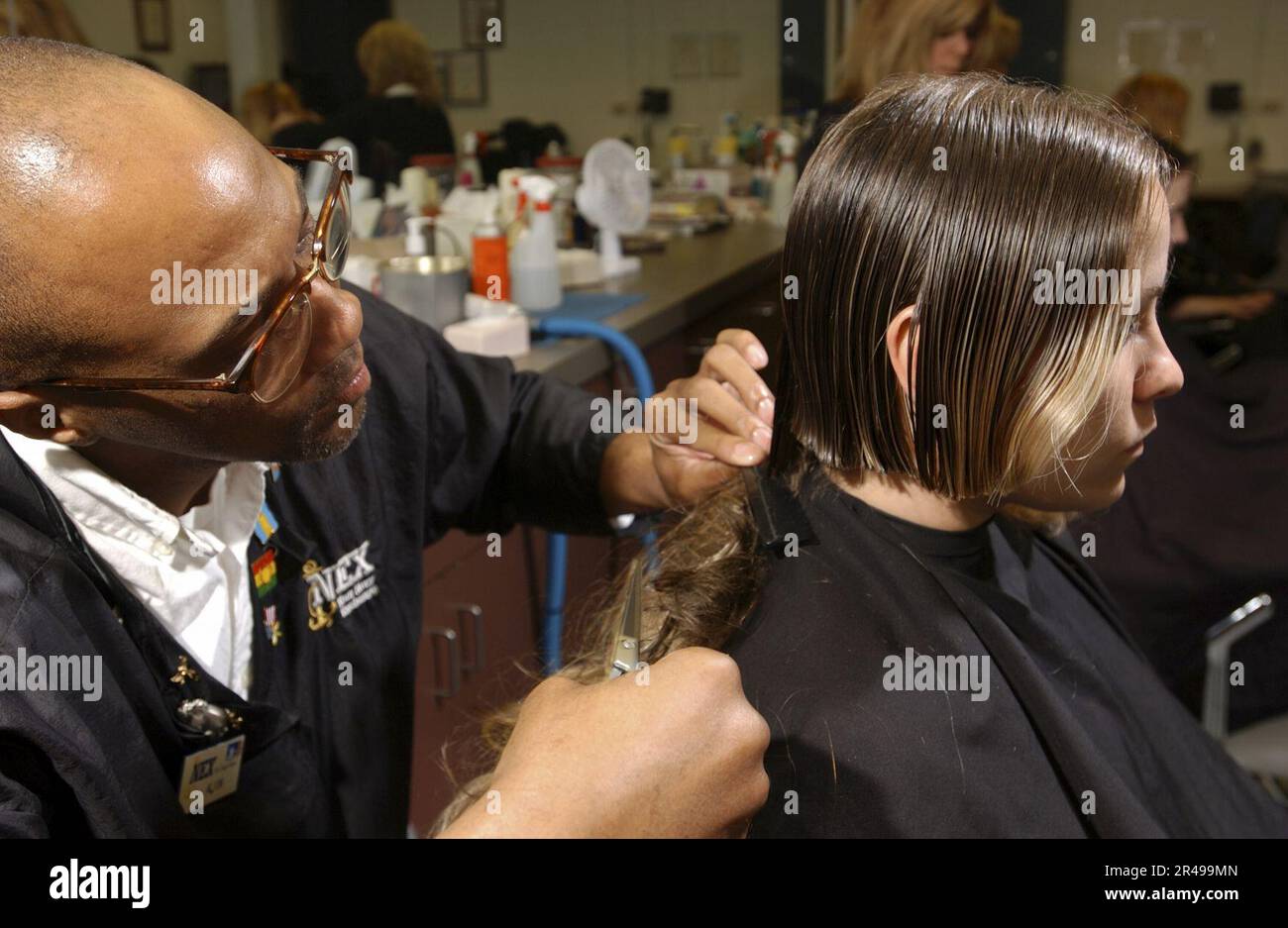 US Navy U.S. Navy recruits get their first military haircuts at the ...