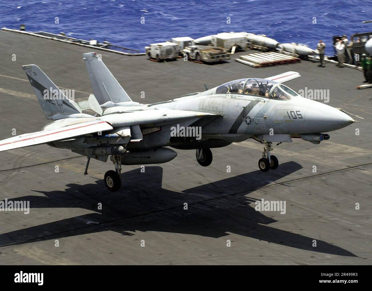 US Navy An F-14D Tomcat comes in for a landing aboard the aircraft ...