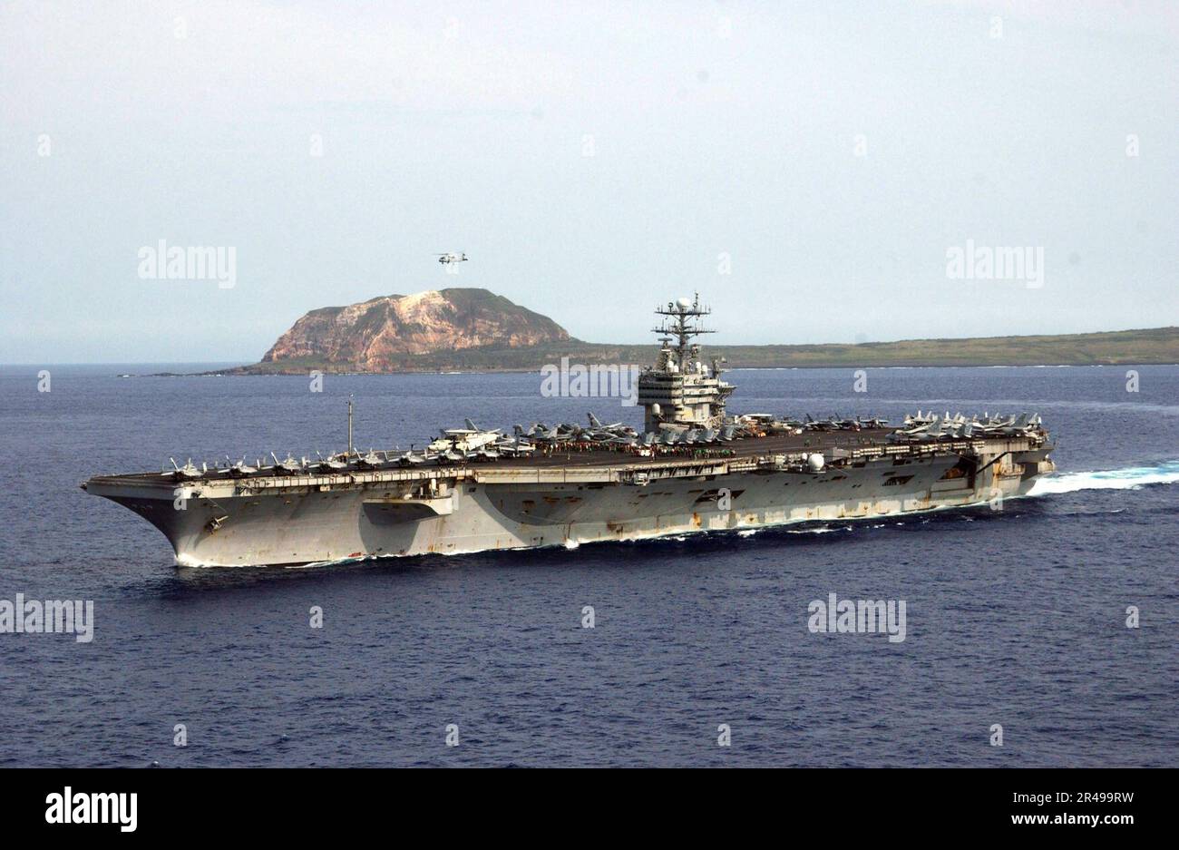US Navy he aircraft carrier USS Carl Vinson (CVN 70) steams away from ...
