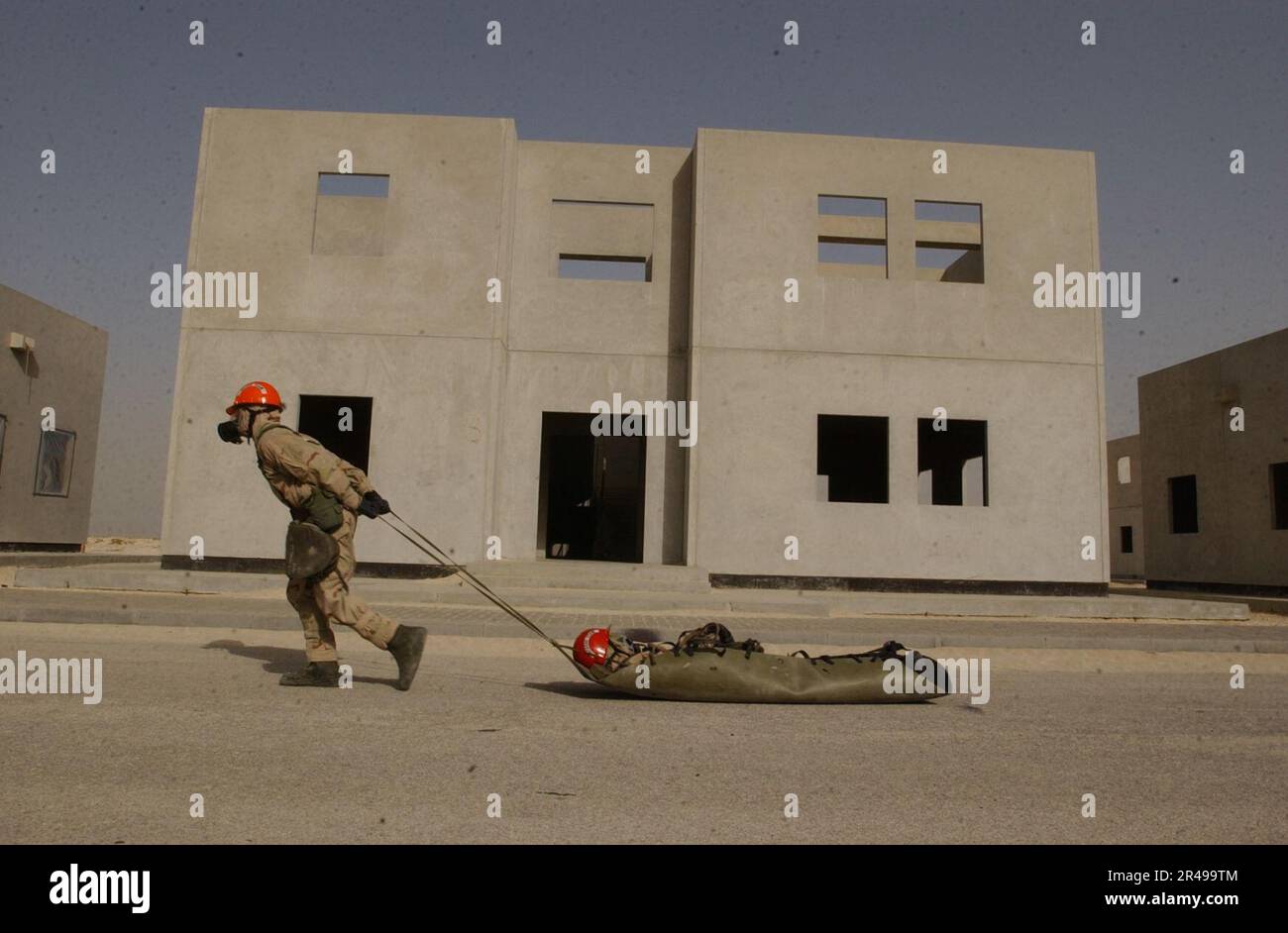 US Navy A member of the Navy Emergency Response Team (ERT) drags a ...