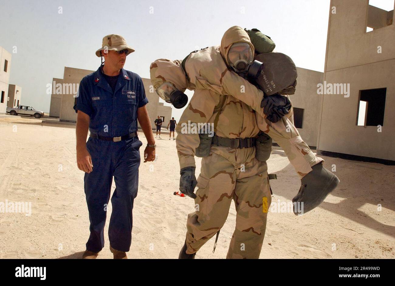US Navy Boatswain's Mate 1st Class instructs members of Naval Support ...