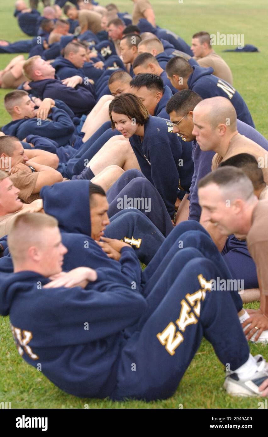 US Navy Seabees conduct their sit-up portion of the Navy Physical ...