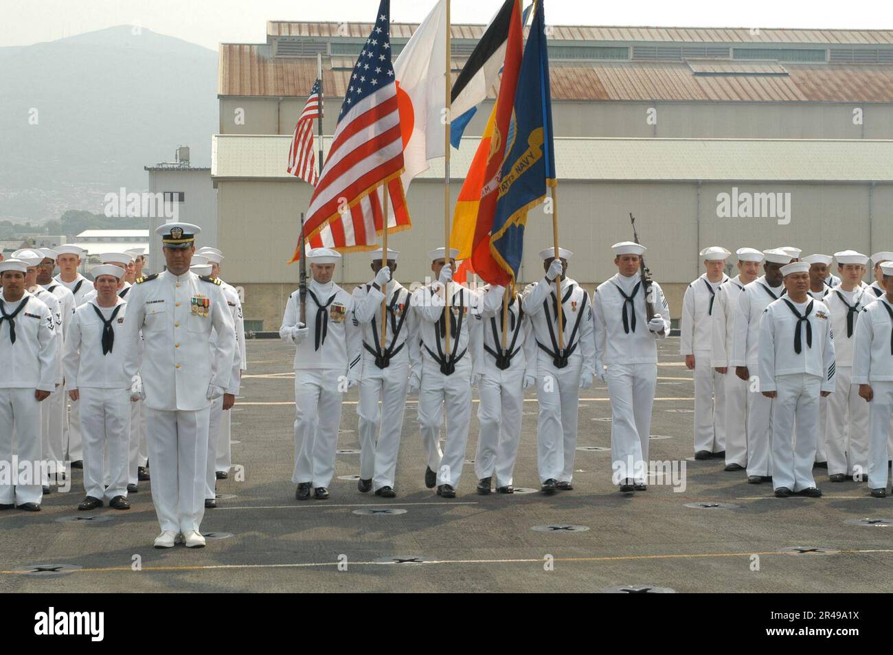 US Navy Color Guard parades the colors during the change of command ...