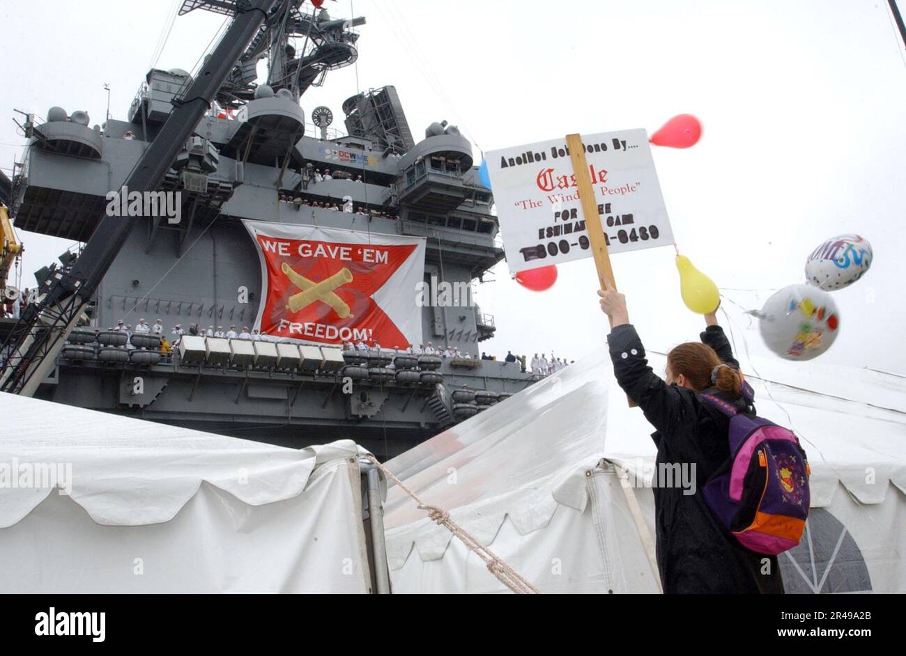 US Navy Excited family members and friends braved a cold rainy day to ...