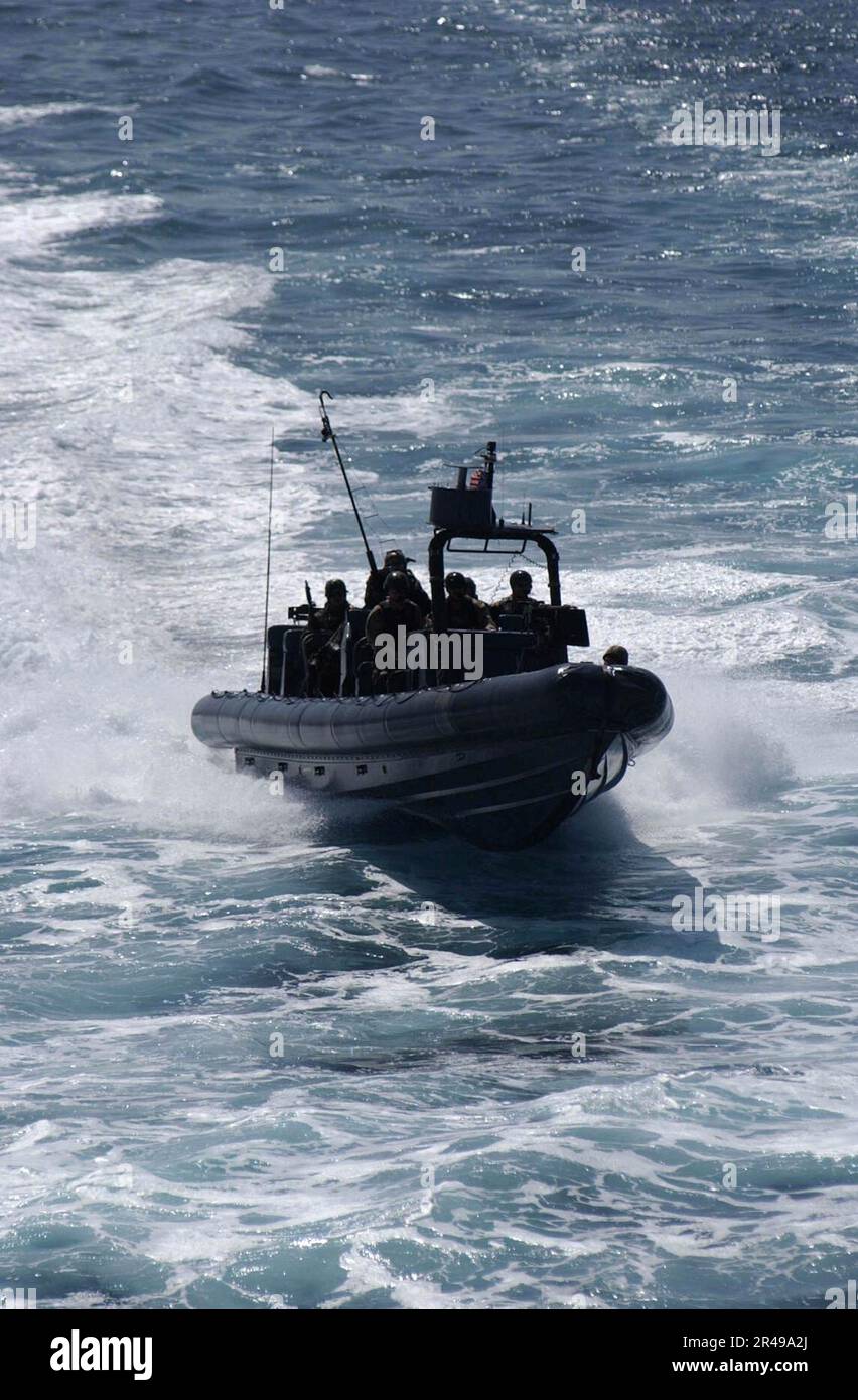 US Navy Special Boat Team prepares to board the Joint Venture High ...
