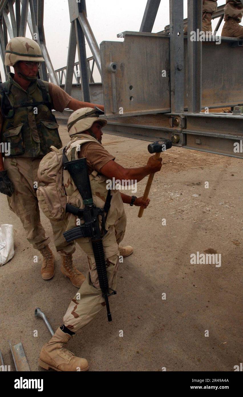 US Navy A U.S. Navy Seabee assigned to Naval Mobile Construction ...