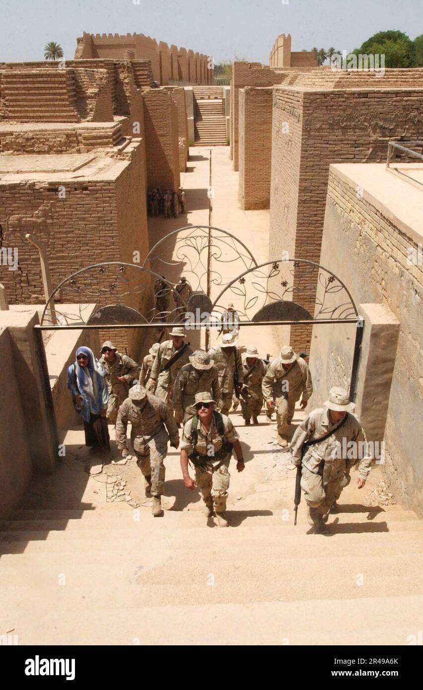 US Navy U.S. Sailors and Marines attached to Camp Babylon, Iraq, take a ...