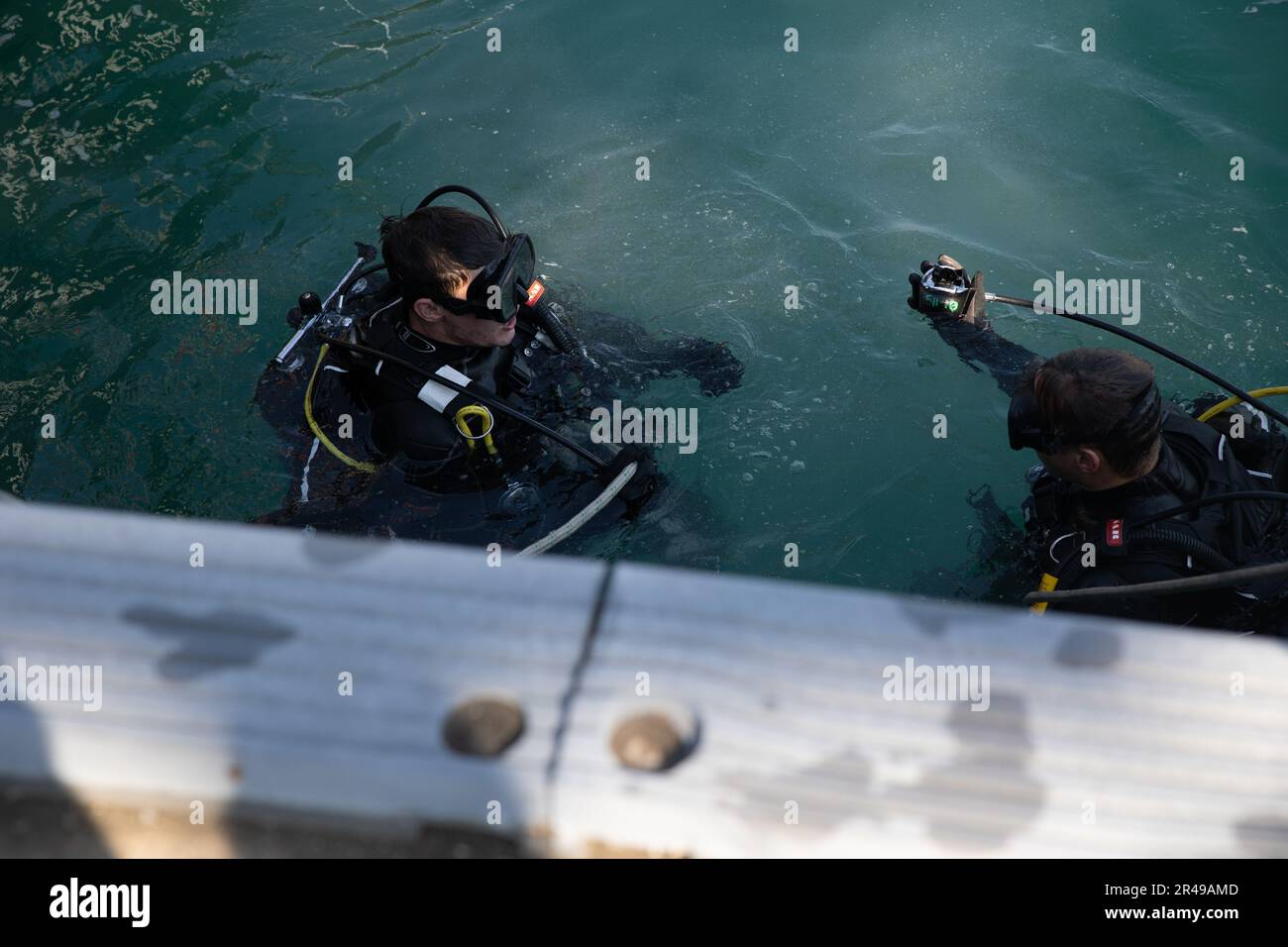 U.S. Army Second Class Divers with the 511th Engineer Dive Detachment ...