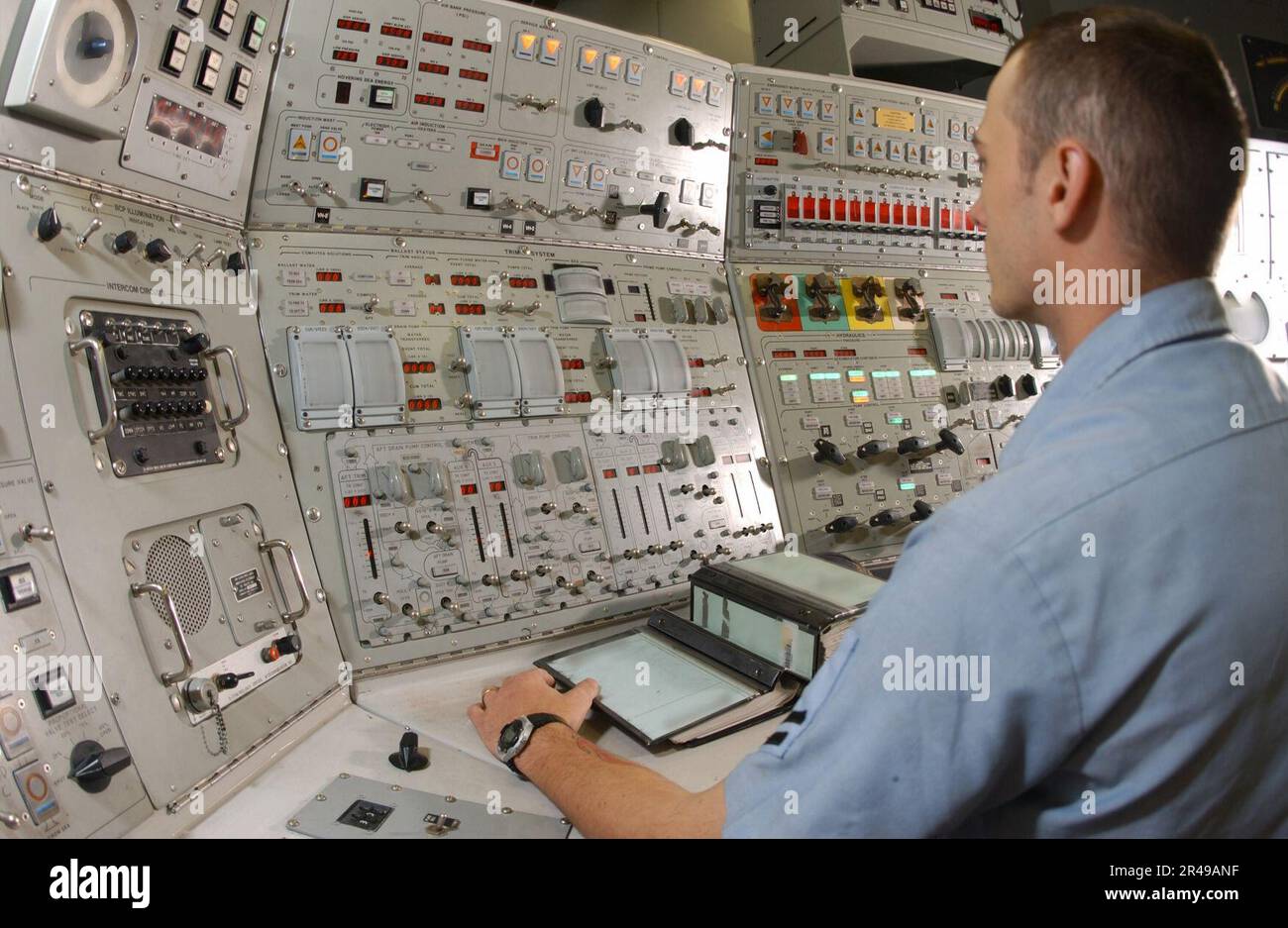 US Navy Sailors utilize a simulator for refresher training at King's ...